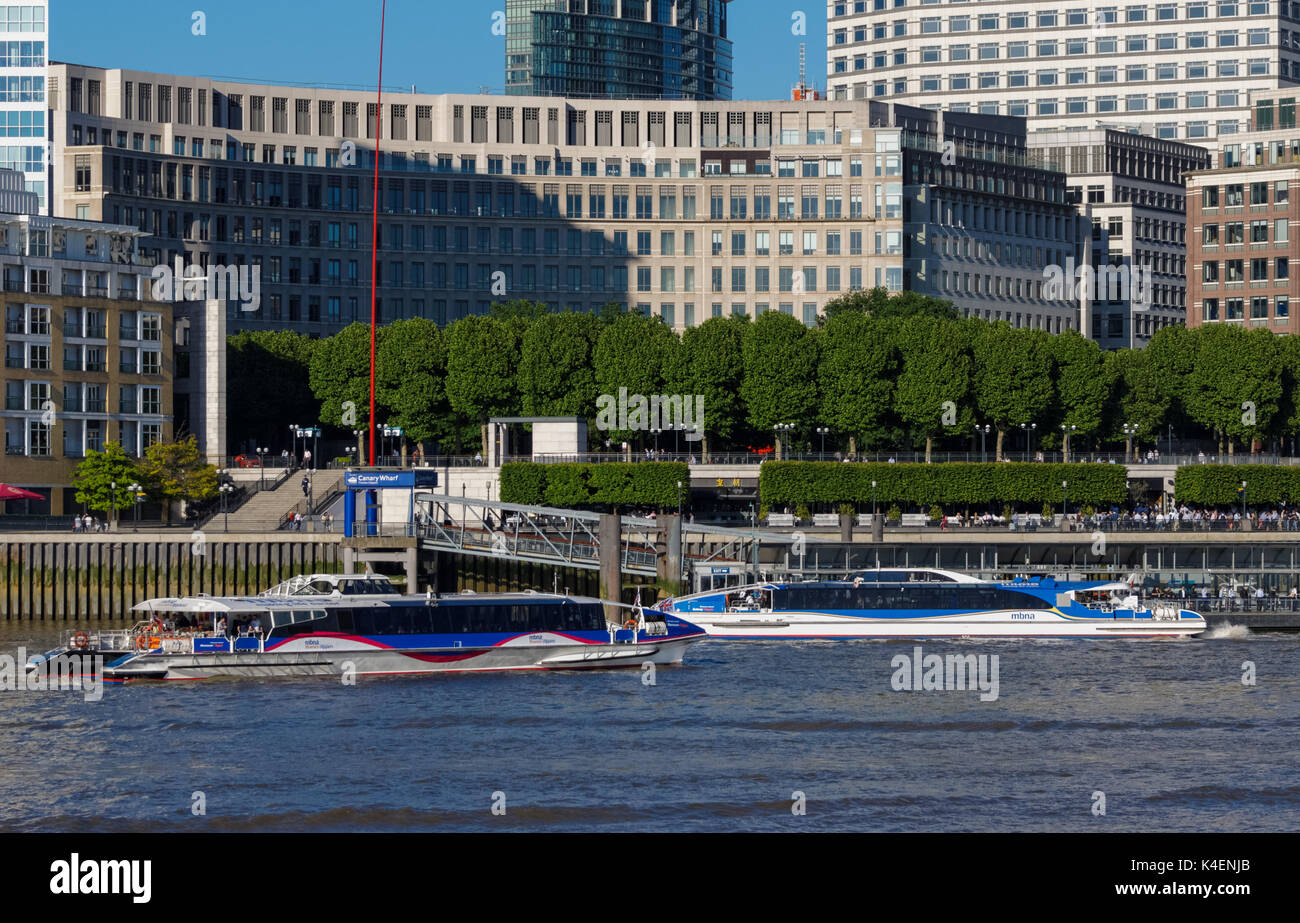 Thames clipper at the Canary Wharf Pier, London England United Kingdom ...