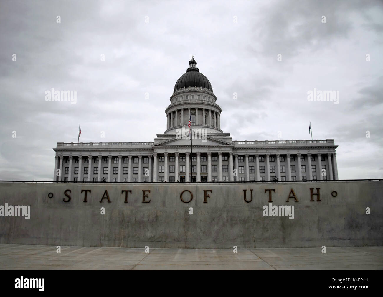 The utah state capitol building with the words 'state of utah' in front ...