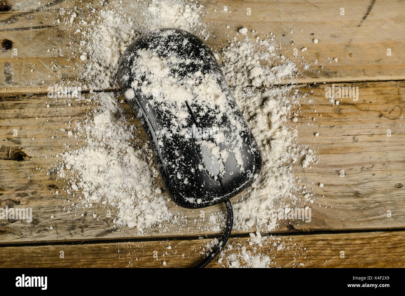 Computer mouse covered in dust, a concept Stock Photo - Alamy