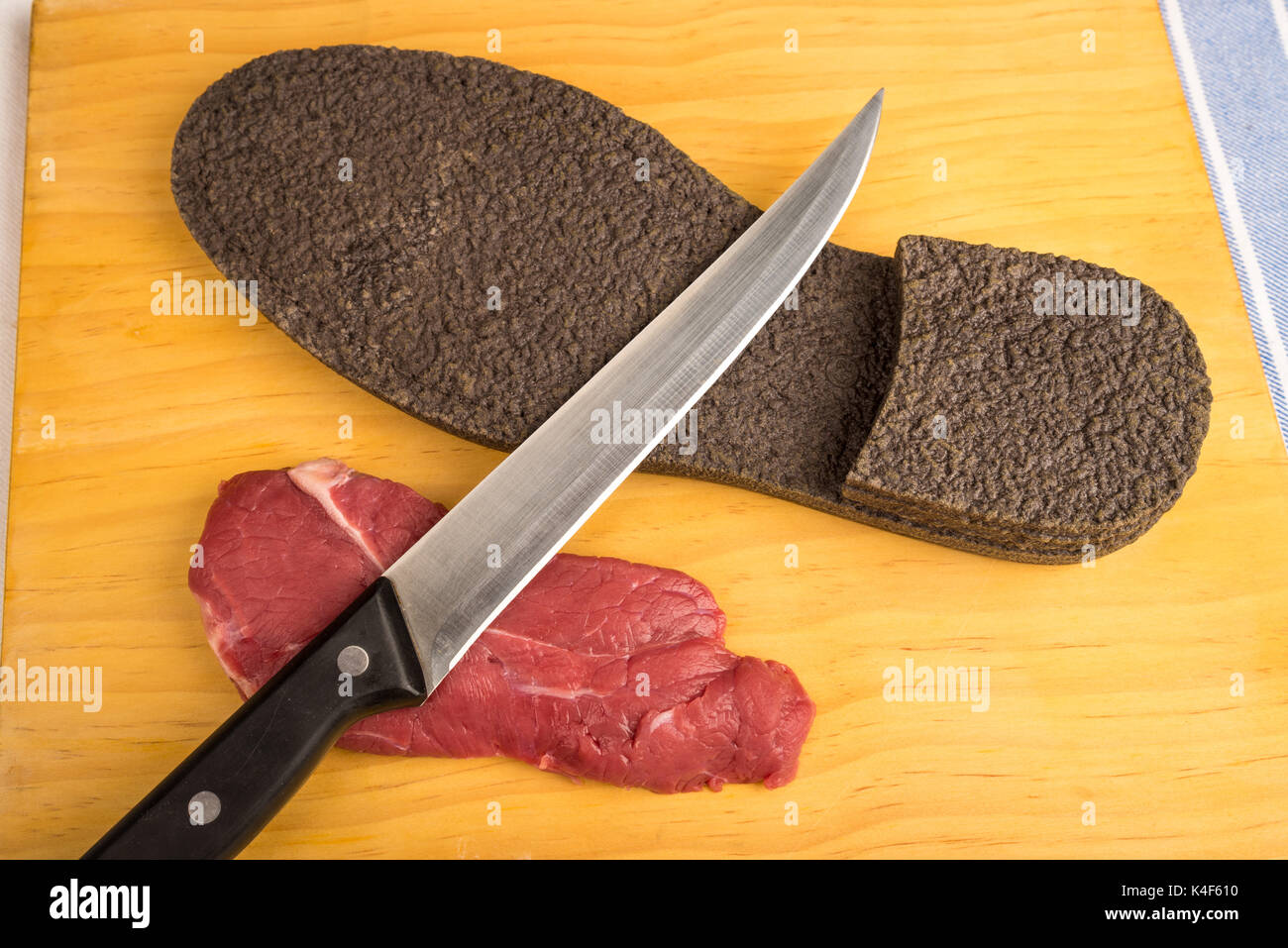 Beef steak next to a shoe sole, a poor quality meat concept Stock Photo ...