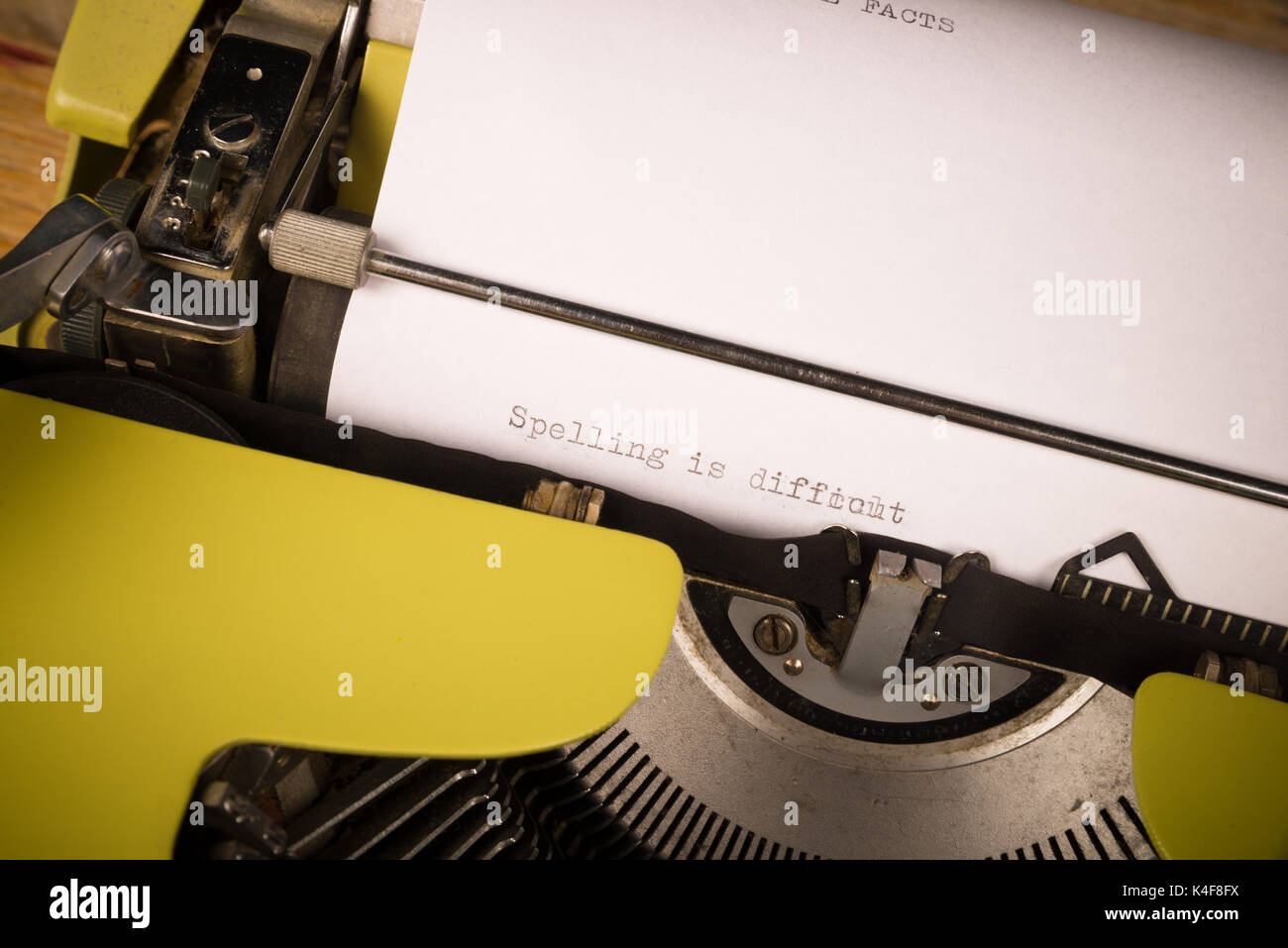Old typewriter with text that contains spelling mistakes, a concept ...