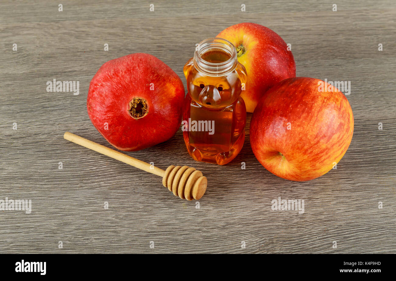 Rosh hashanah jewish New Year holiday concept. Traditional symbols. honey pomegranate apple Rosh ...