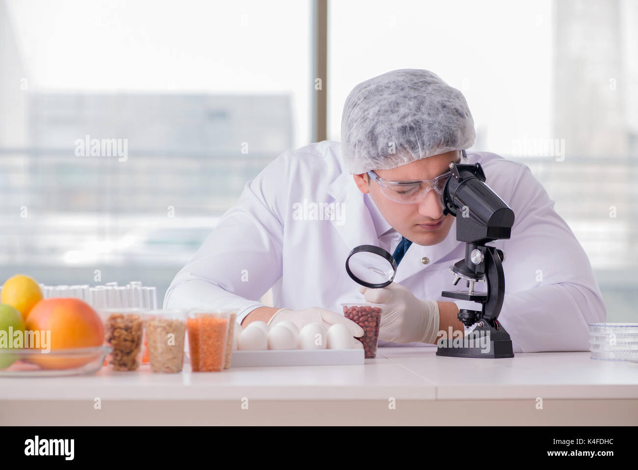 Nutrition expert testing food products in lab Stock Photo - Alamy