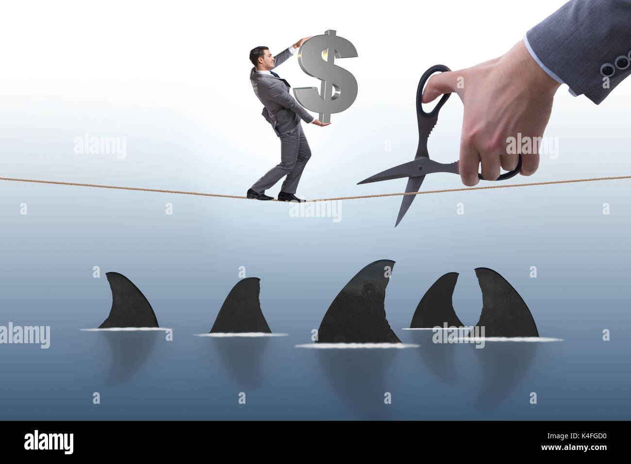 Hand cutting rope in business risk concept Stock Photo - Alamy