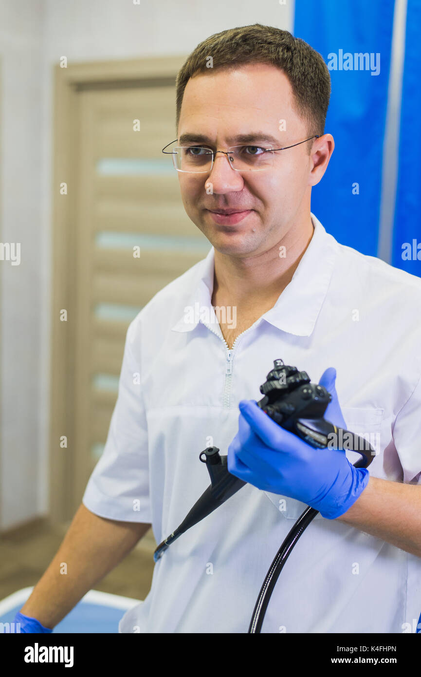 proctologist doctor holding Ligador hemorroidal in office Stock Photo ...