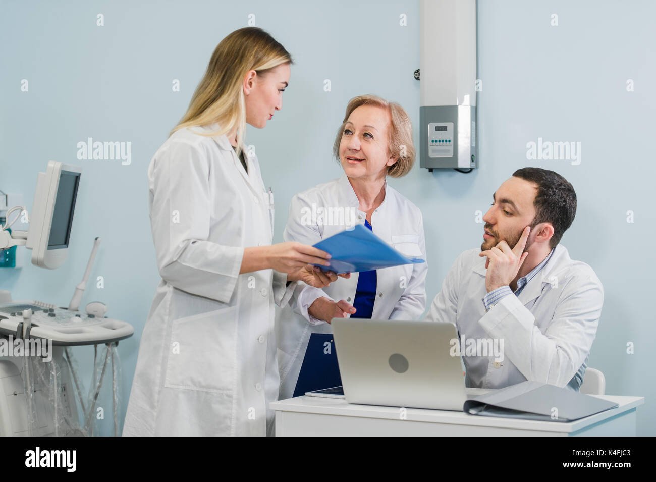 Portrait of a smart young doctors works in a hospital Stock Photo - Alamy