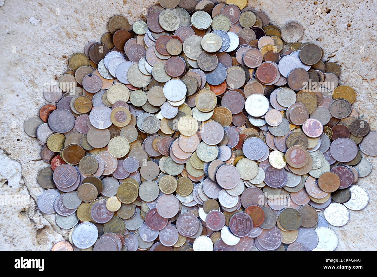 pile of world coins Stock Photo - Alamy