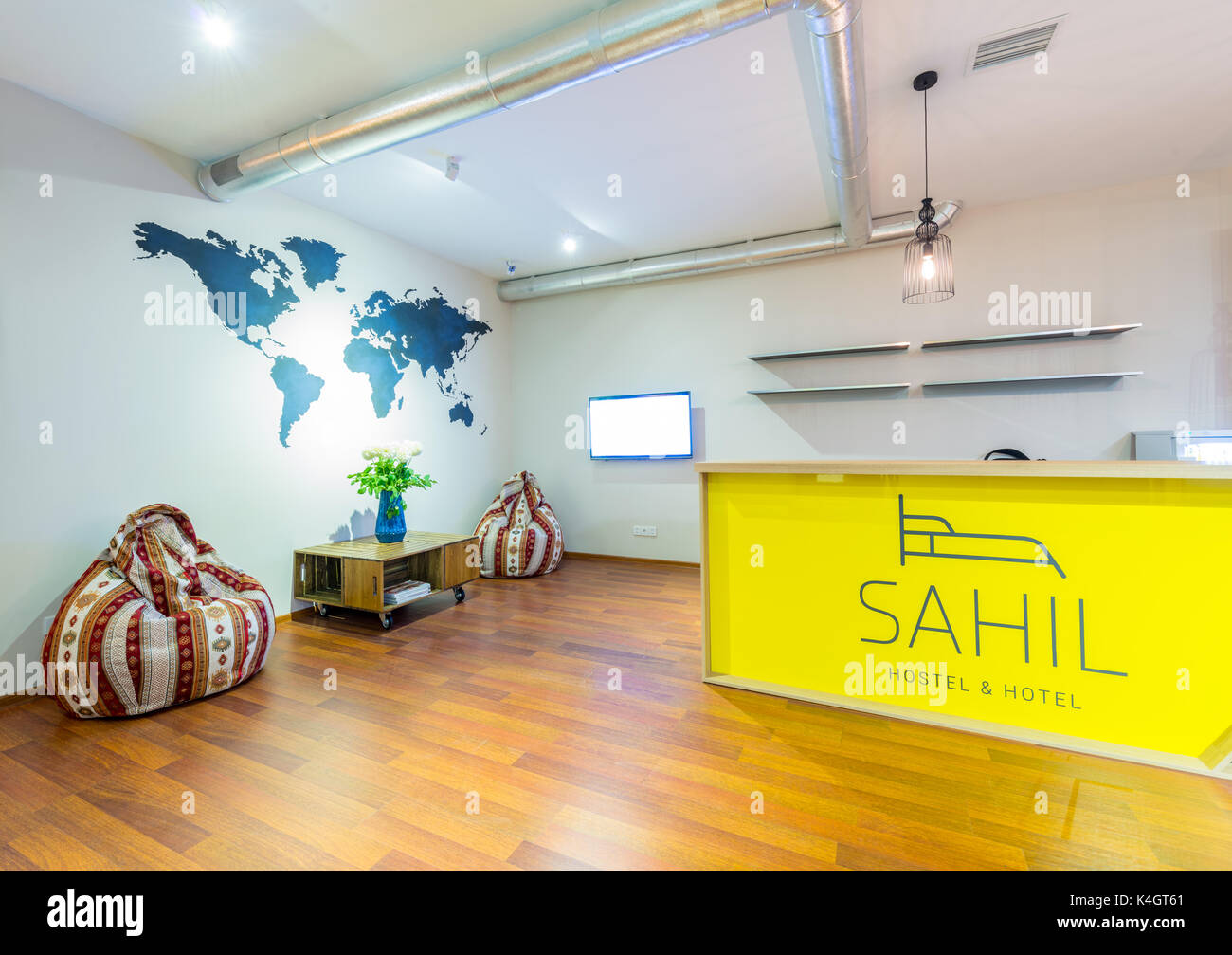 Hotel reception of hostel dormitory Stock Photo - Alamy