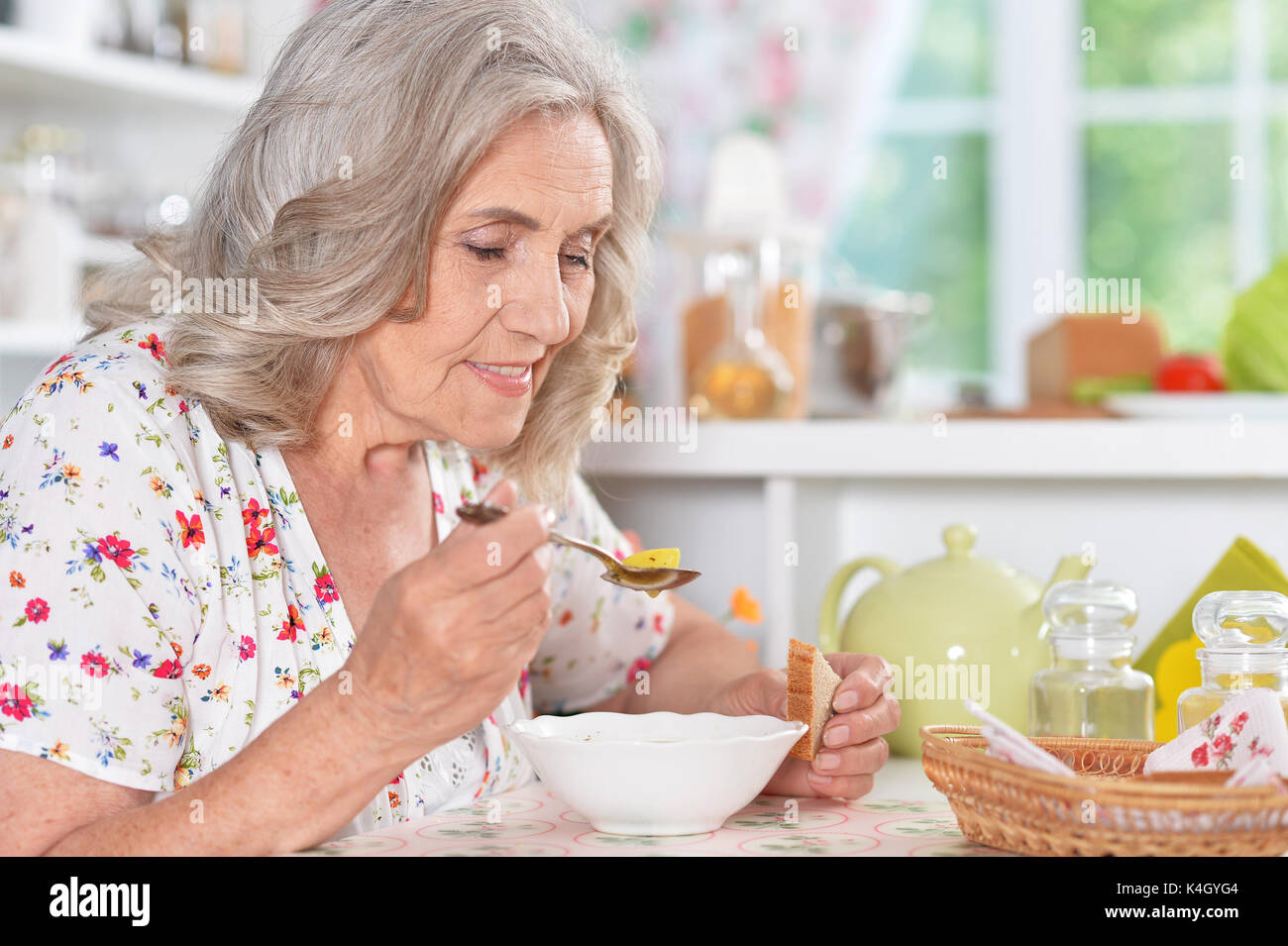 An old woman eating soup hi-res stock photography and images - Alamy