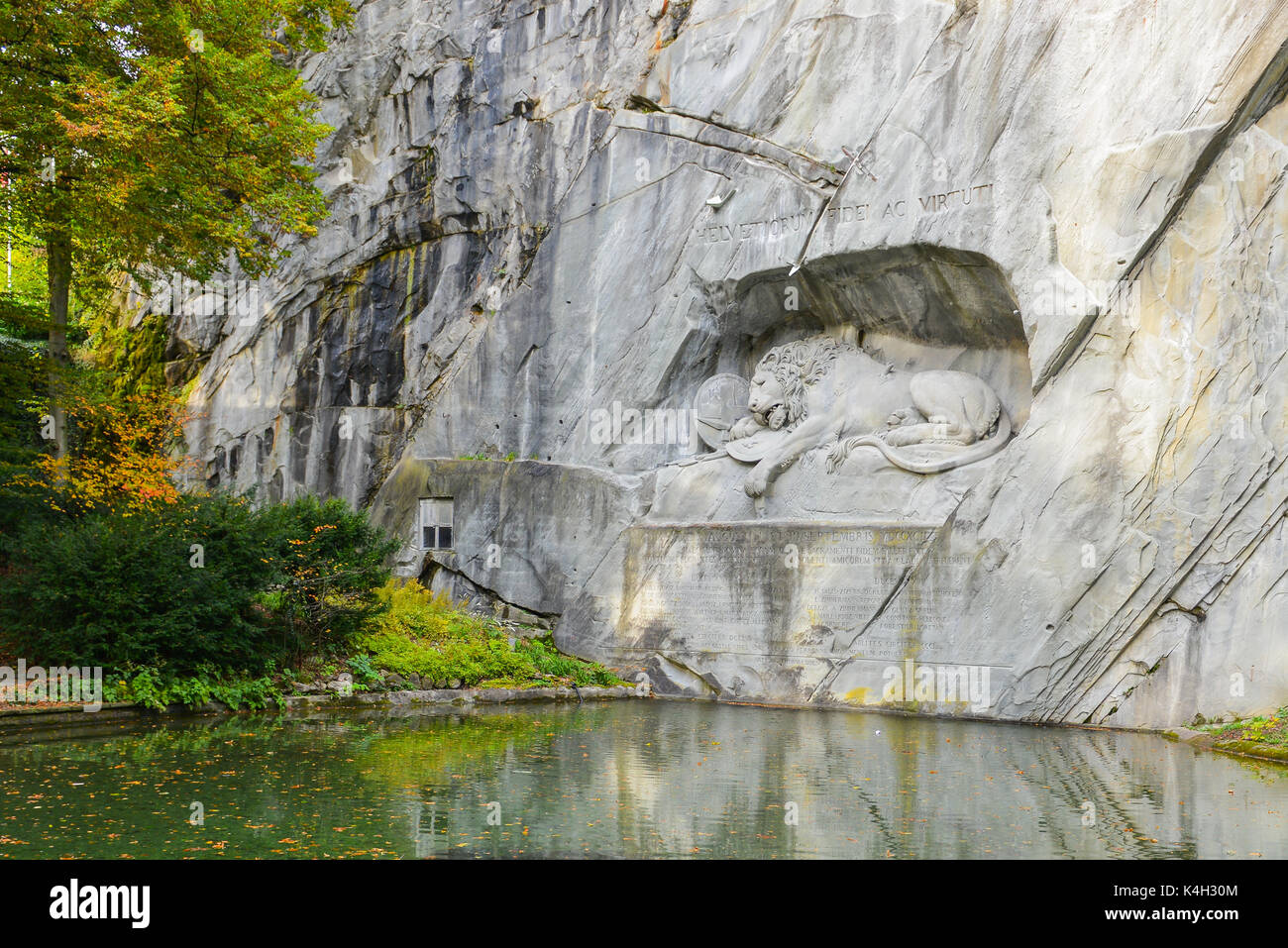LUCERNE, SWITZERLAND - October 10, 2014 : The dying lion statue called ...
