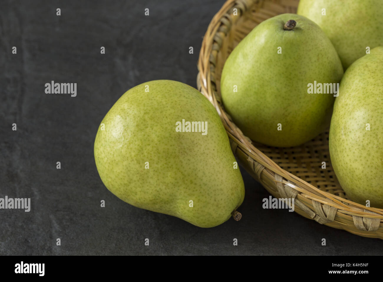 Green Anjou Pear on the slate background Stock Photo - Alamy