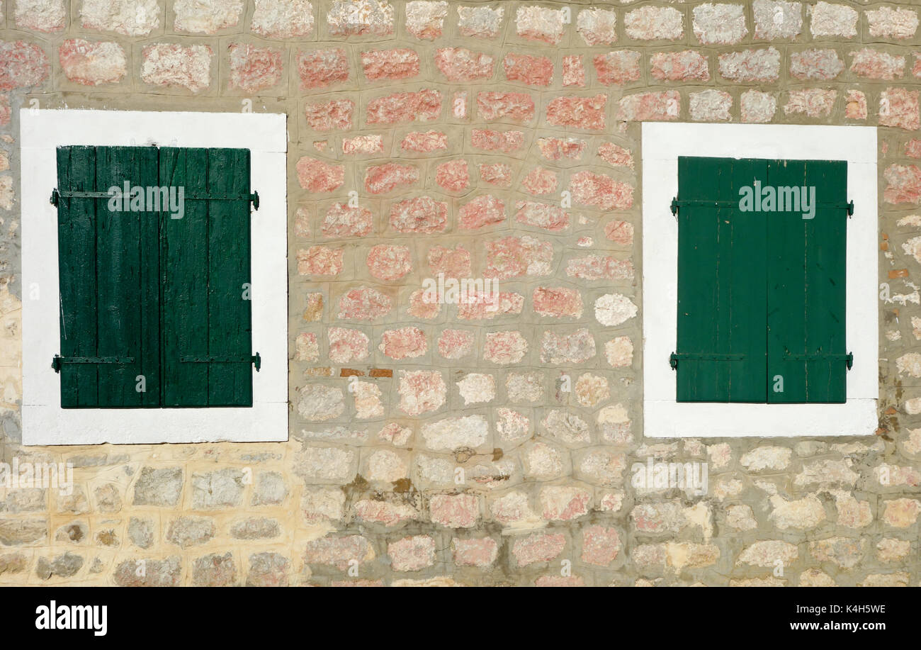 old wall with two windows Stock Photo - Alamy