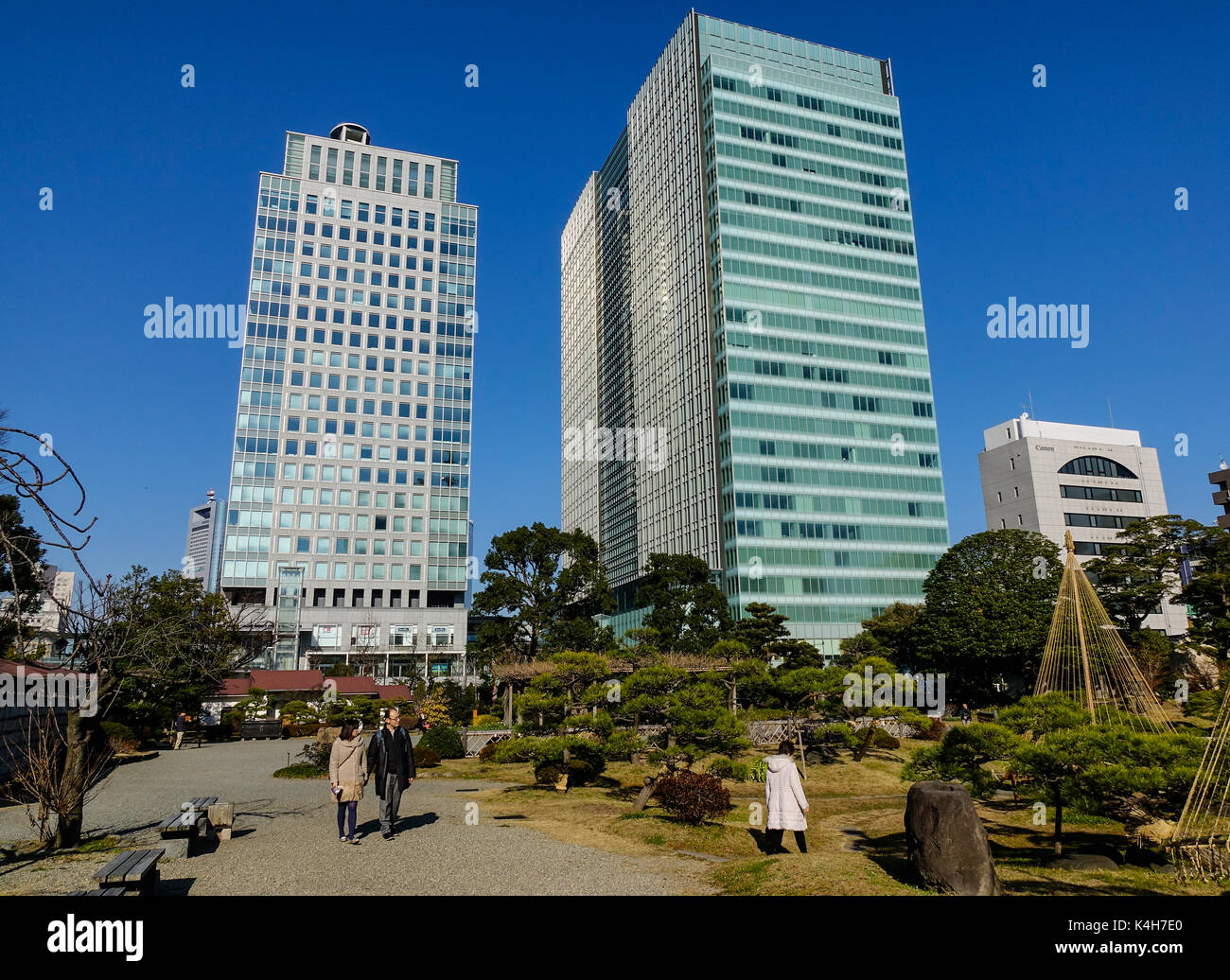 Tokyo, Japan - Jan 3, 2016. Modern buildings with green park at ...