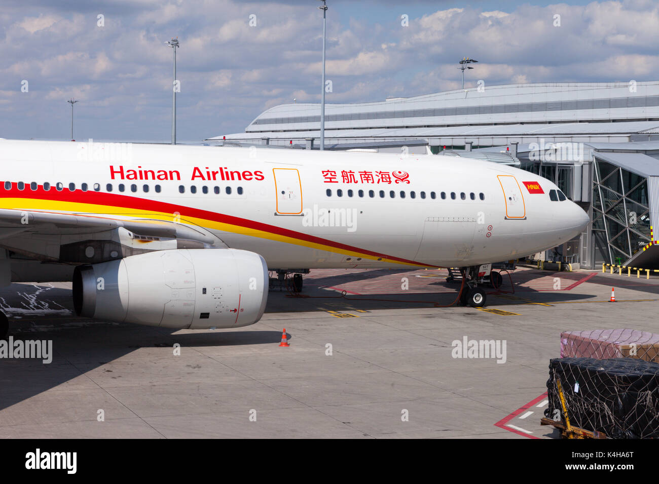 Hainan Airlines airplane parked in Prague airport terminal ...