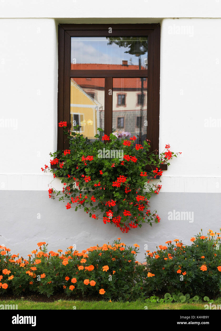 Beautiful country house window with flowers Stock Photo - Alamy