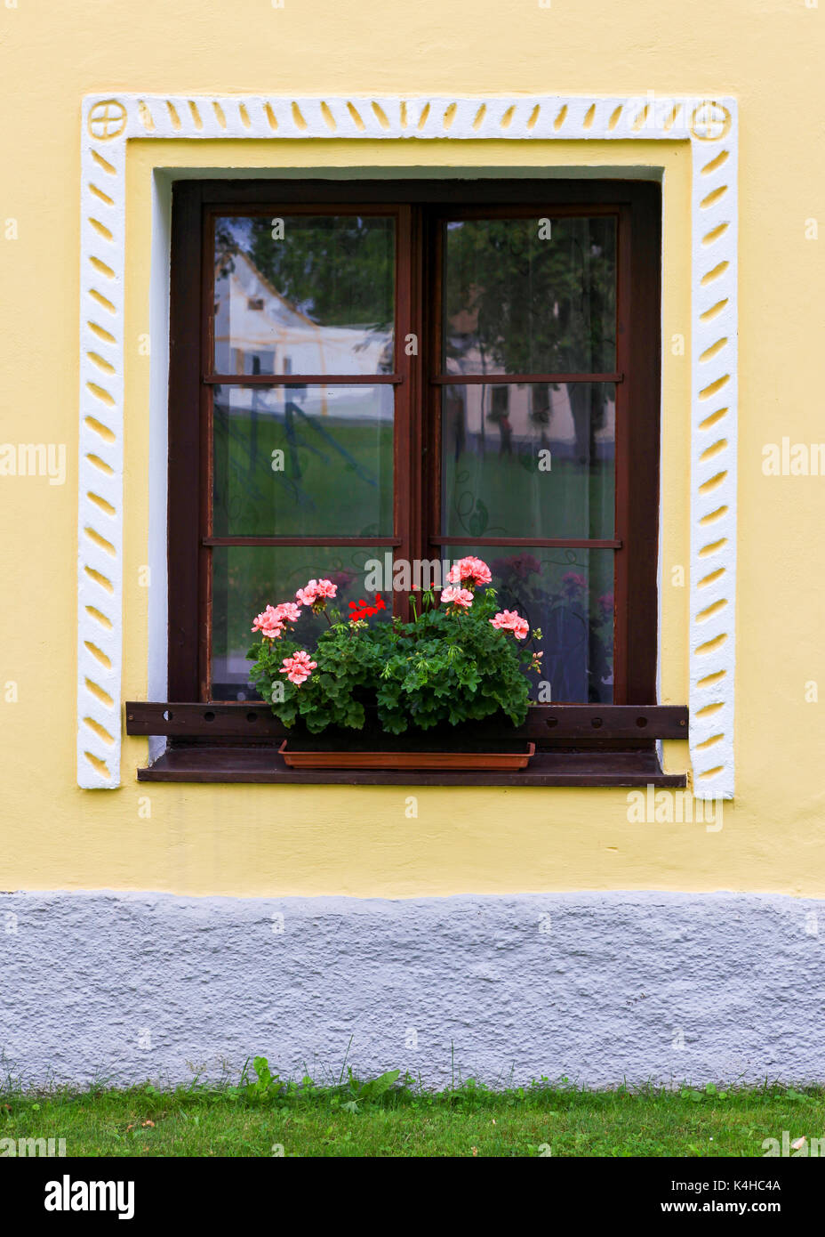Beautiful country house window with flowers Stock Photo - Alamy