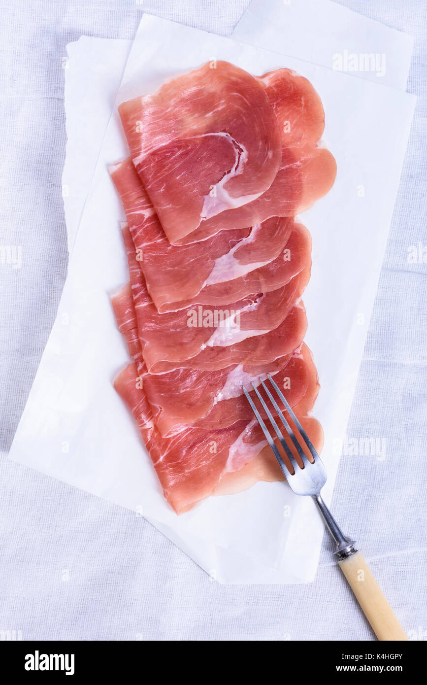 Prosciutto crudo snack, spanish jamon. Dry-cured pig meat. Above view ...