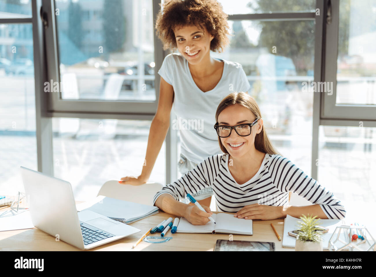 Girls friends studying together concept hi-res stock photography and ...