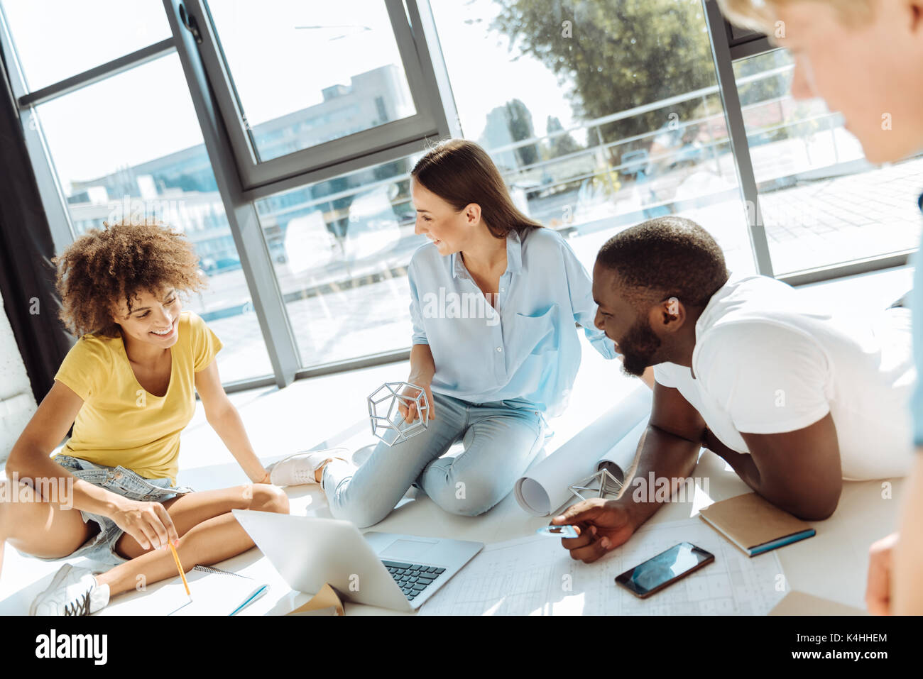 Positive international students sharing their ideas Stock Photo - Alamy
