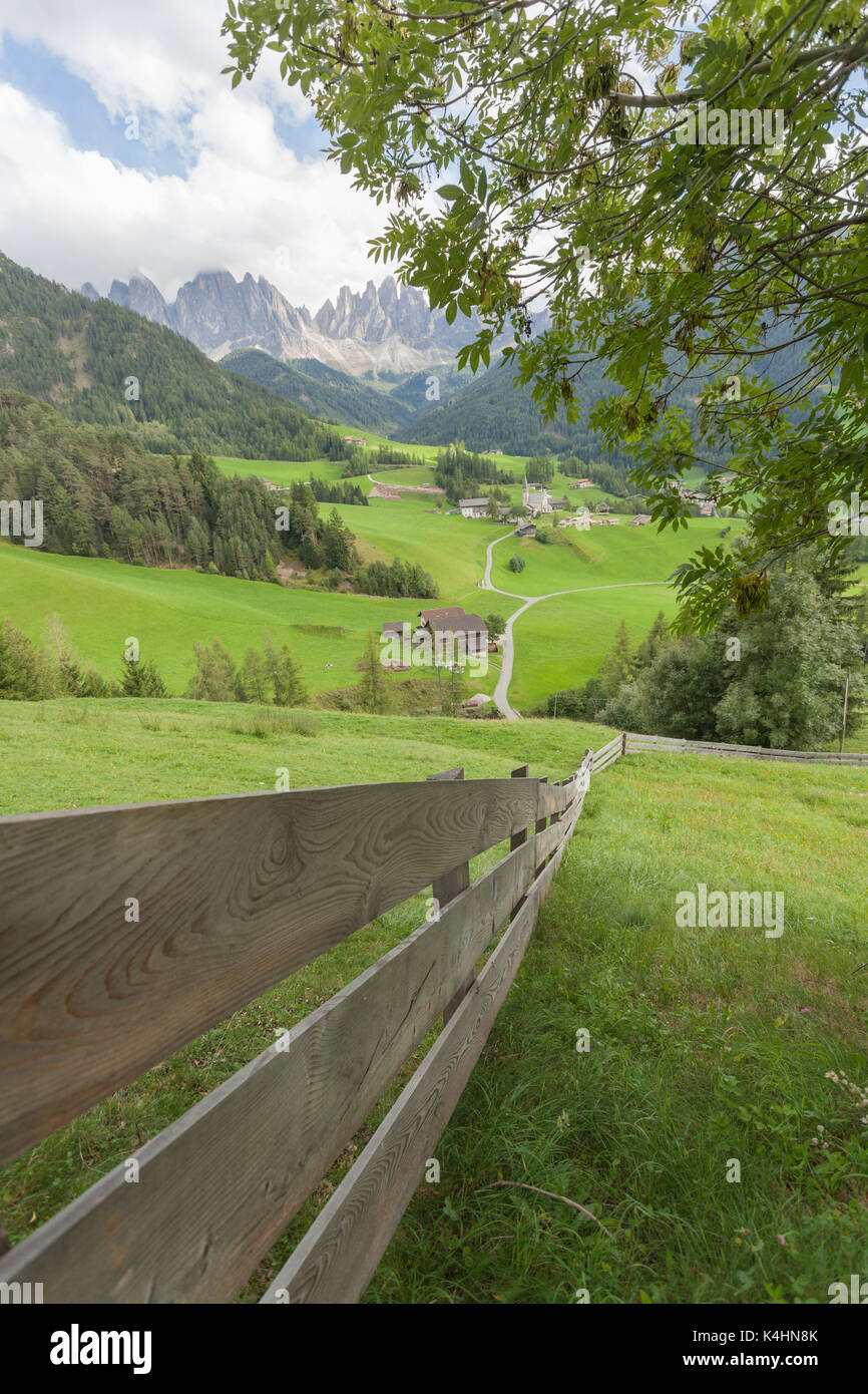 Wooden fence next to an Italian mountain pasture in St. Magdalena in ...