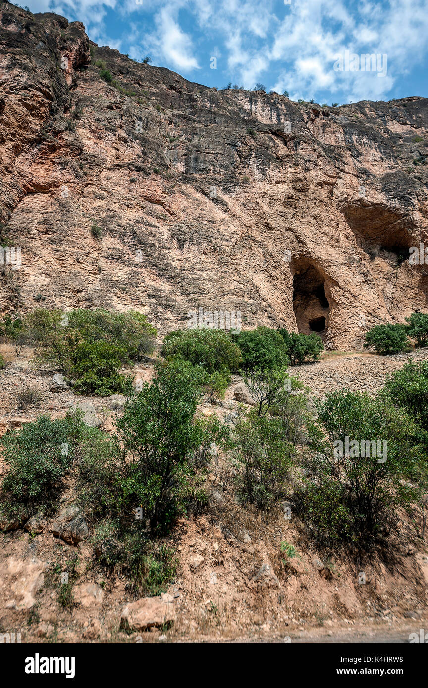 Armenia. Rocks with many grottoes and caves on the way to the monastery ...