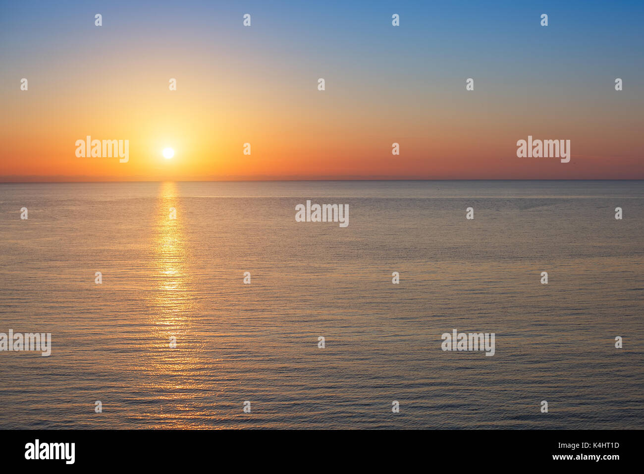 Beautiful sea sunset. Evening sea background Stock Photo - Alamy