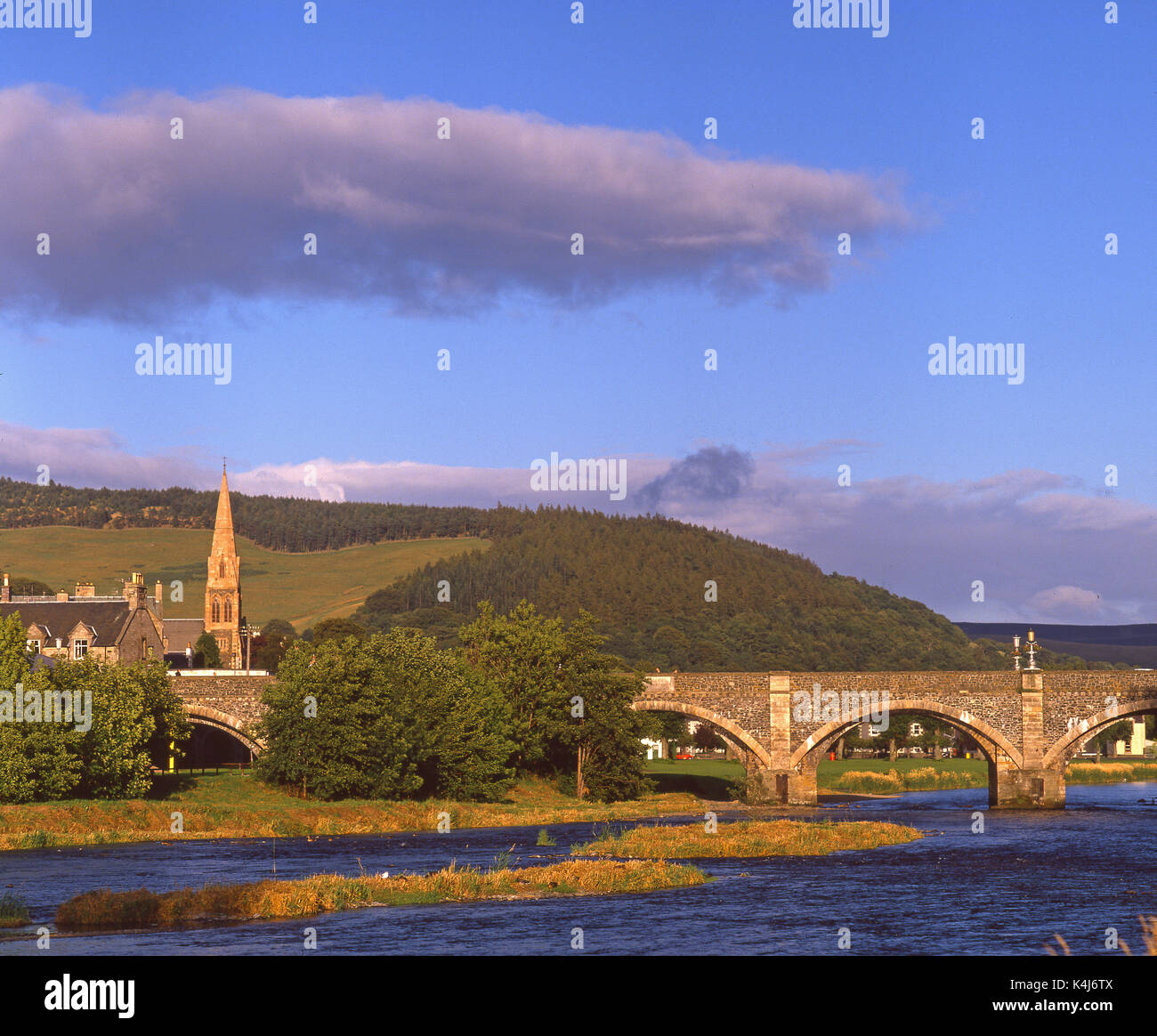 Evening light striking the bridge across the River Tweed in Peebles ...