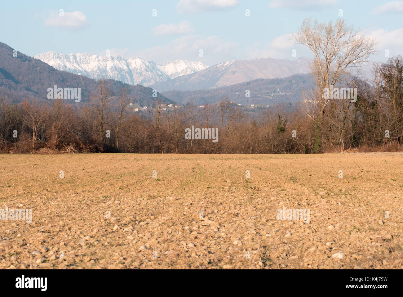 Landscape among the hills awaiting spring Stock Photo - Alamy