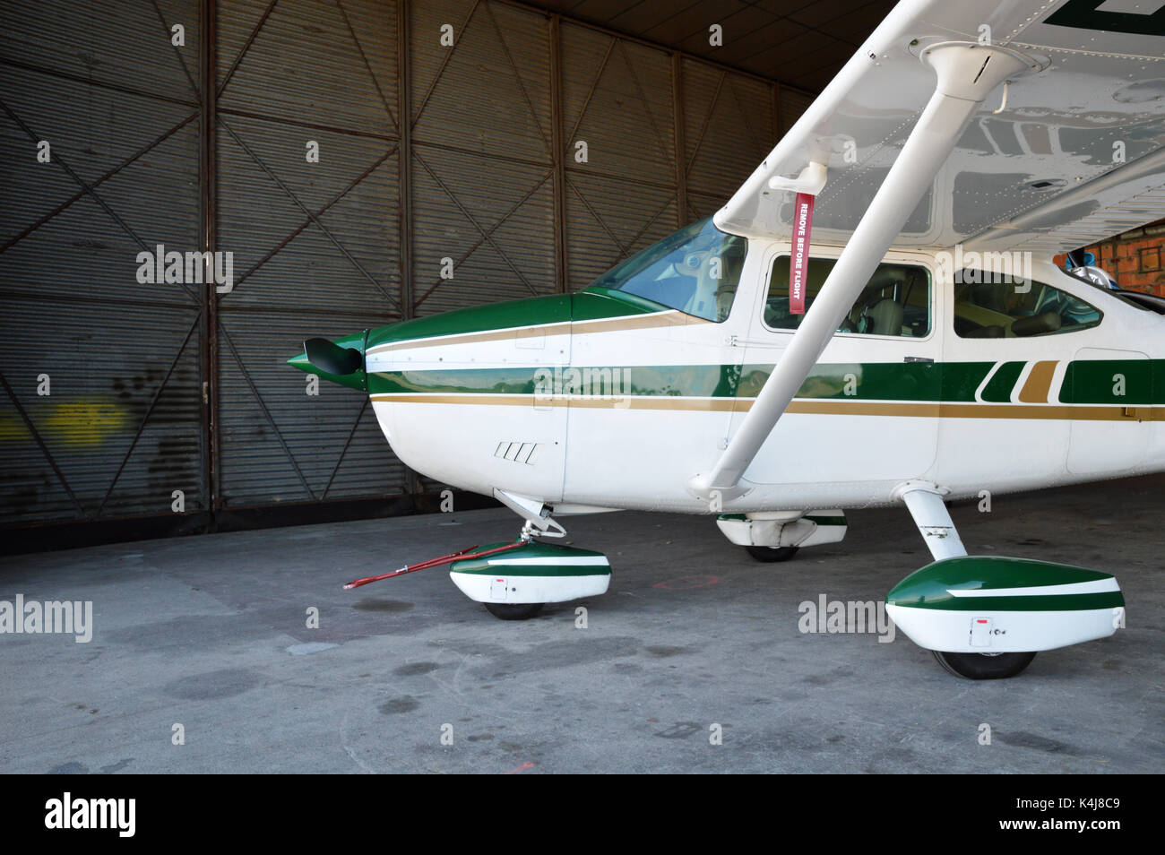 A small plane, parked in hangar airplane Stock Photo - Alamy
