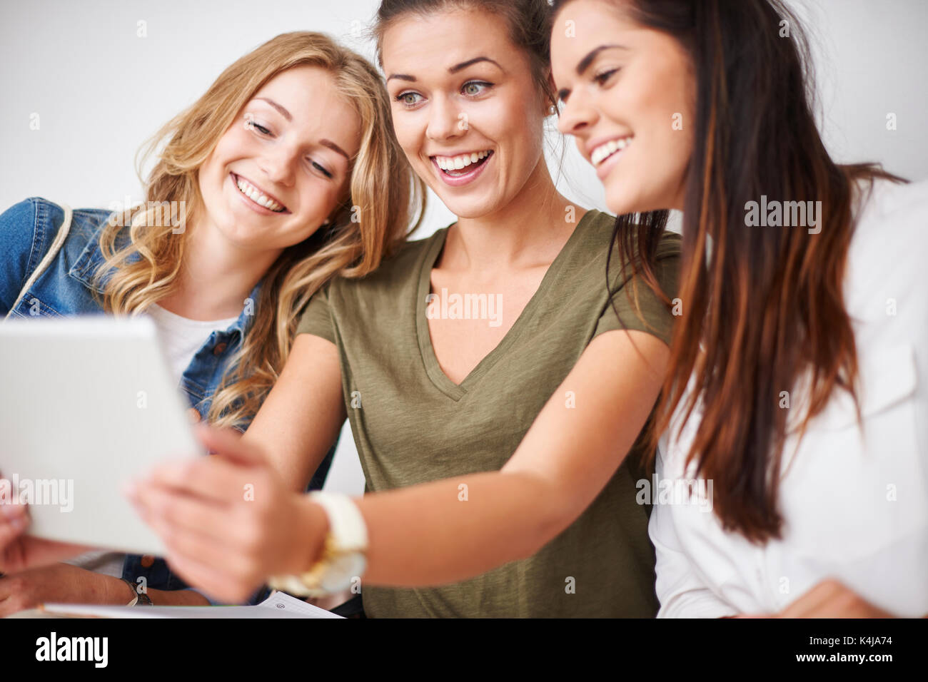 Sharing the funny images with friends Stock Photo - Alamy
