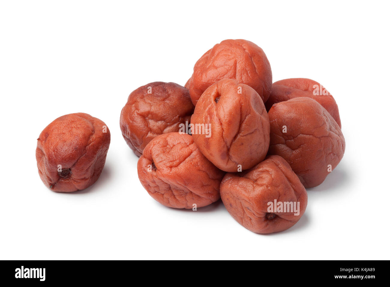 Traditional Japanese umeboshi on white background Stock Photo - Alamy