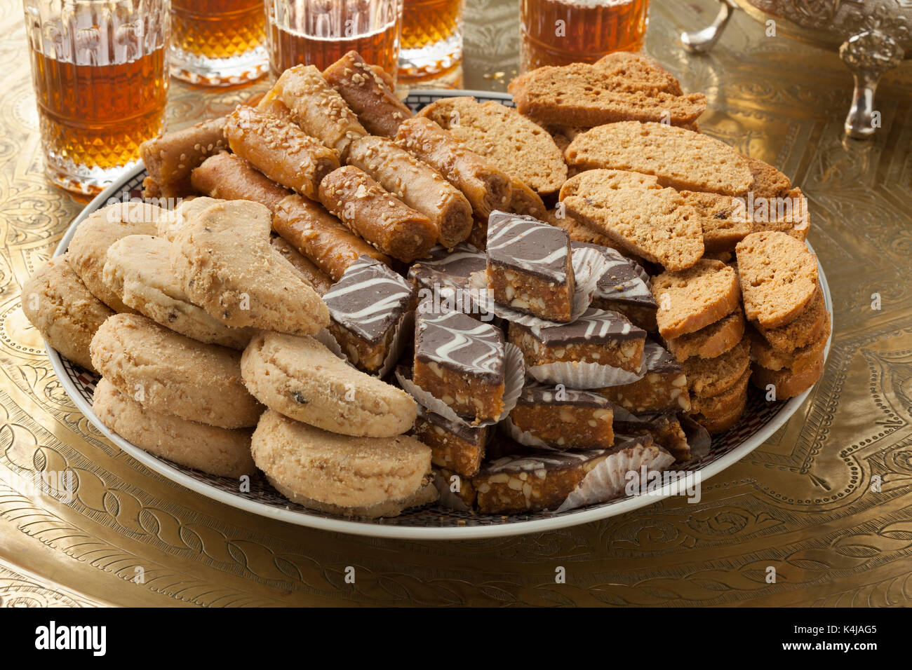 Traditional variety of festive Moroccan cookies and mint tea Stock ...