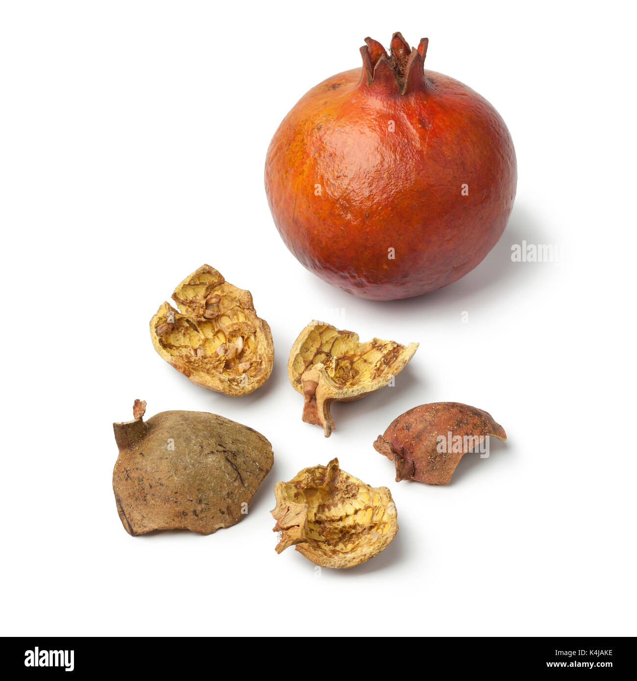 Moroccan dried pomegranate peel on white background Stock Photo - Alamy