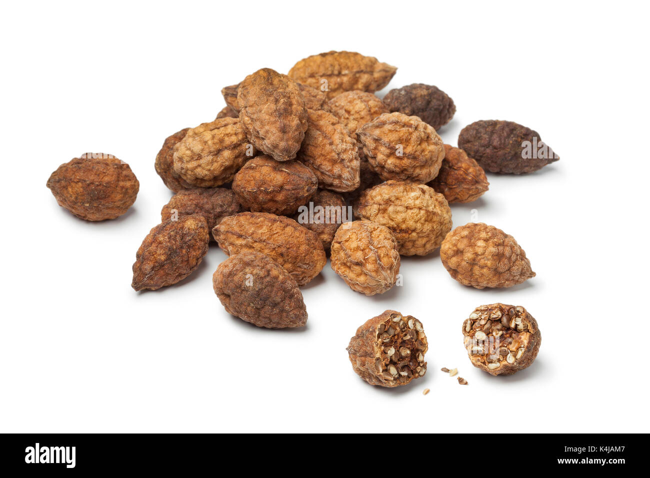 Heap of dried caperberries on white background Stock Photo - Alamy