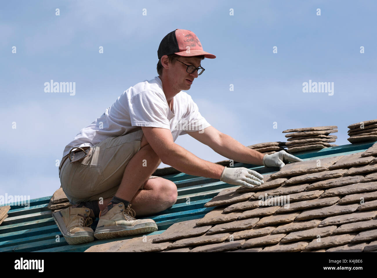 Fixing roof tiles hi-res stock photography and images - Alamy