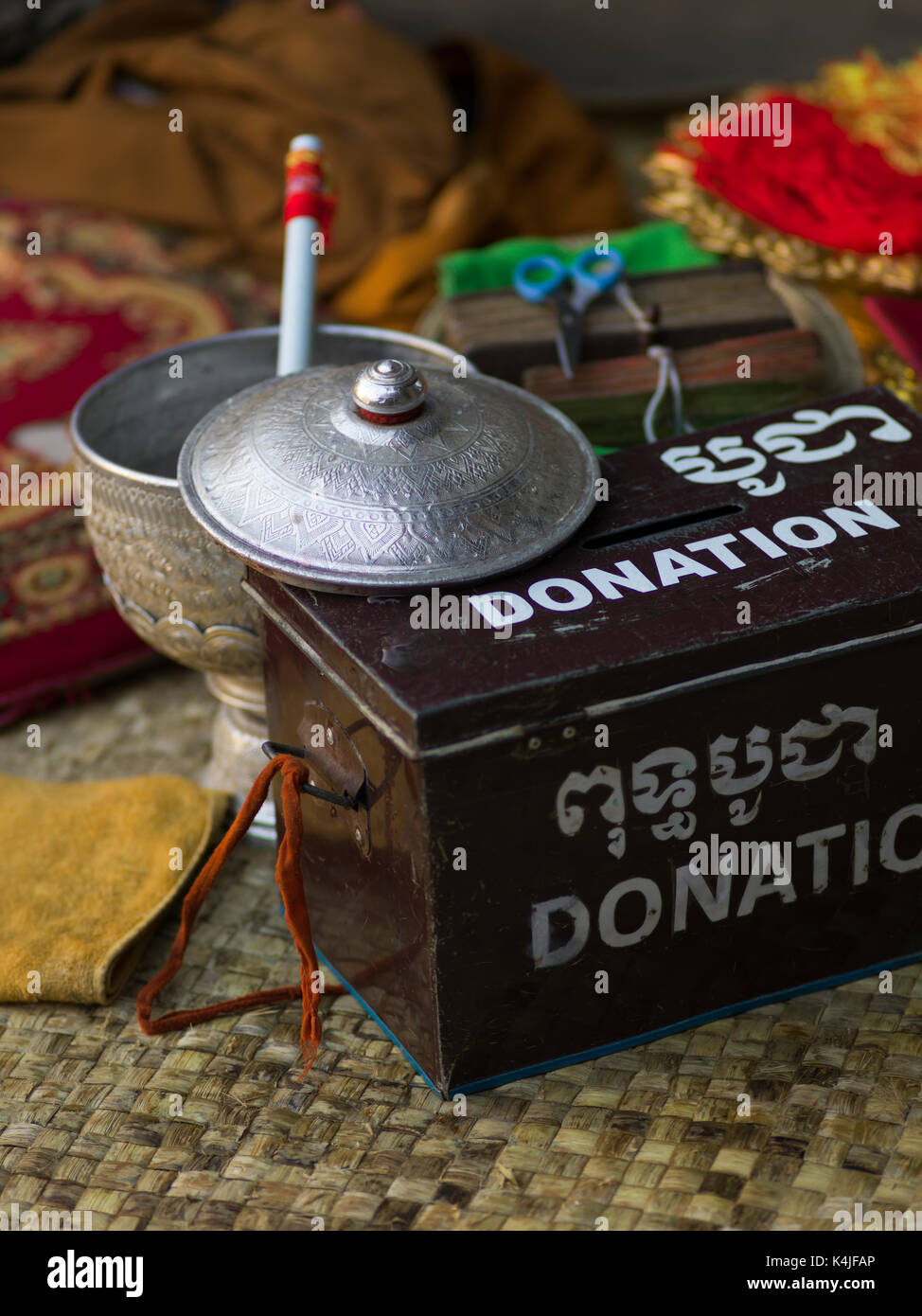 Temple offering boxes hi-res stock photography and images - Alamy