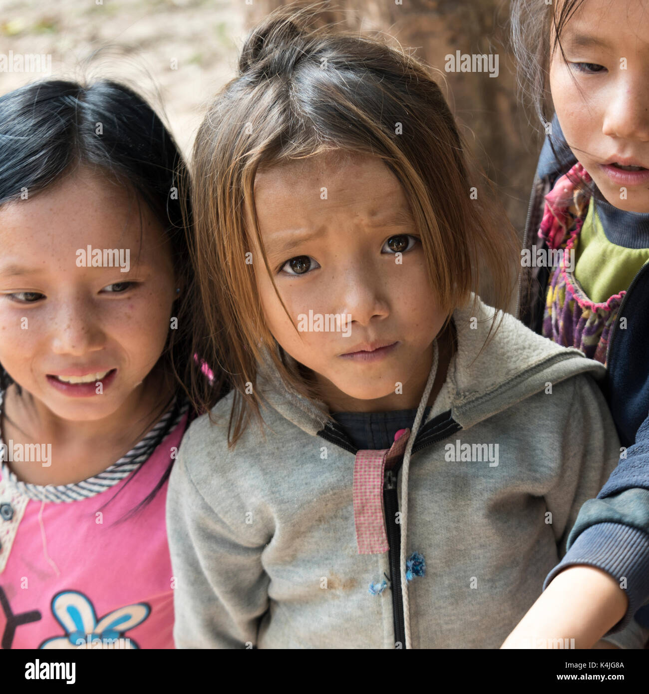 Three children laos hi-res stock photography and images - Alamy