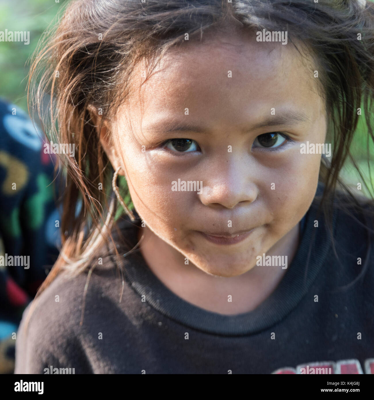 Cute local people looking at camera hi-res stock photography and images ...