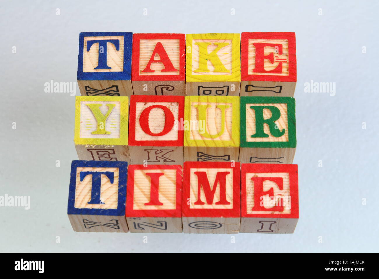The term take your time displayed visually on a white background using ...