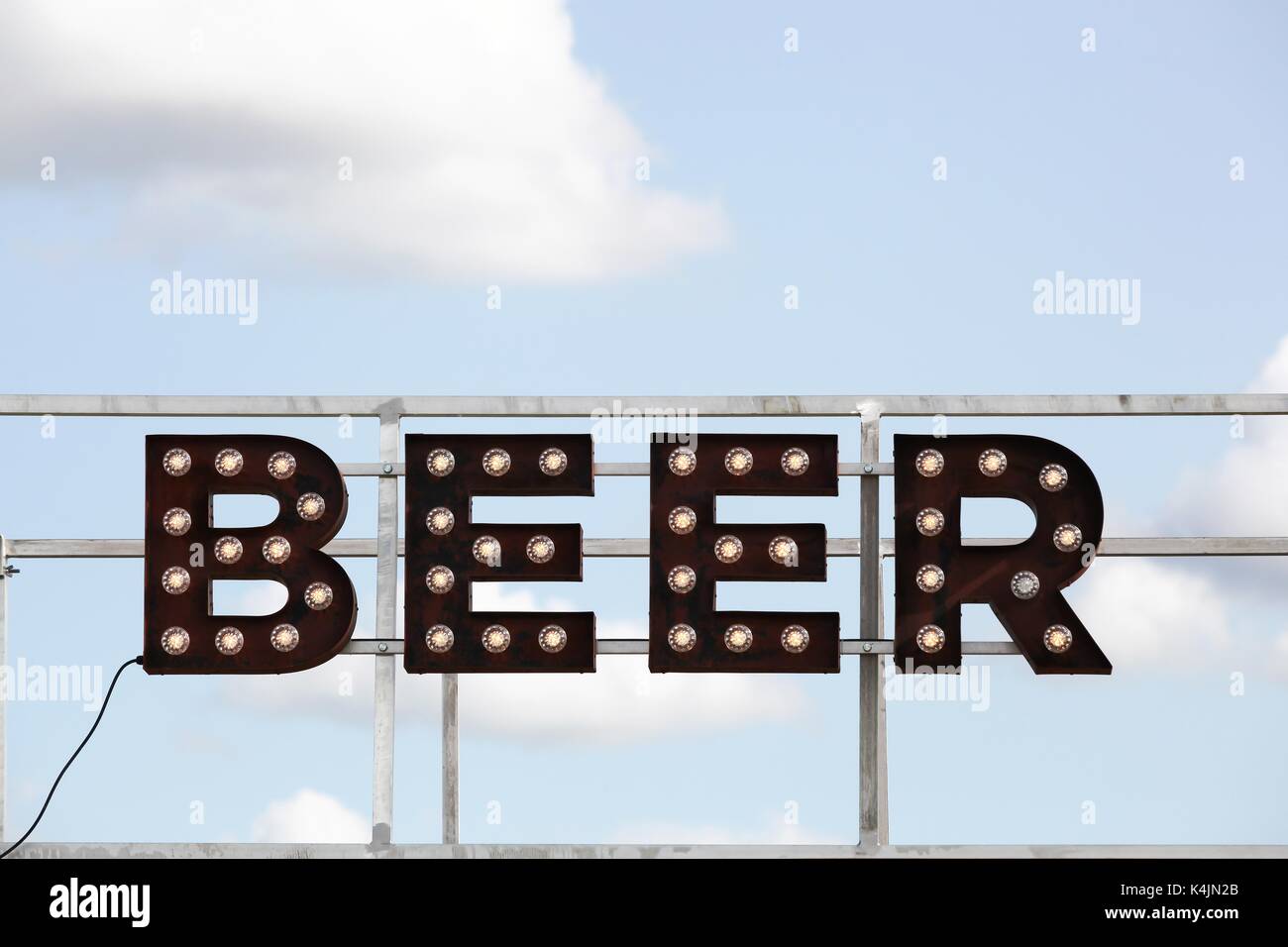 Beer sign and inscription Stock Photo - Alamy
