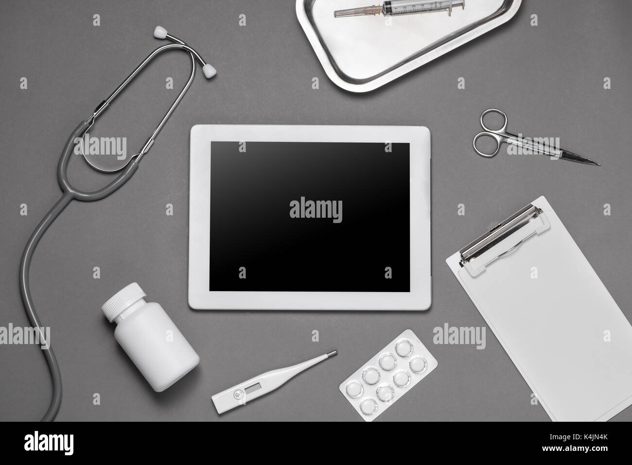 Top view of doctor desk table with stethoscope and medical items. Flat ...