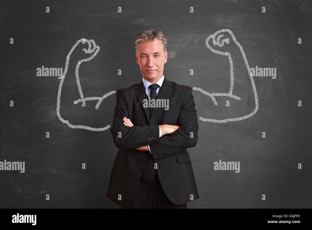Powerful and successful businessman with chalk muscles as self ...