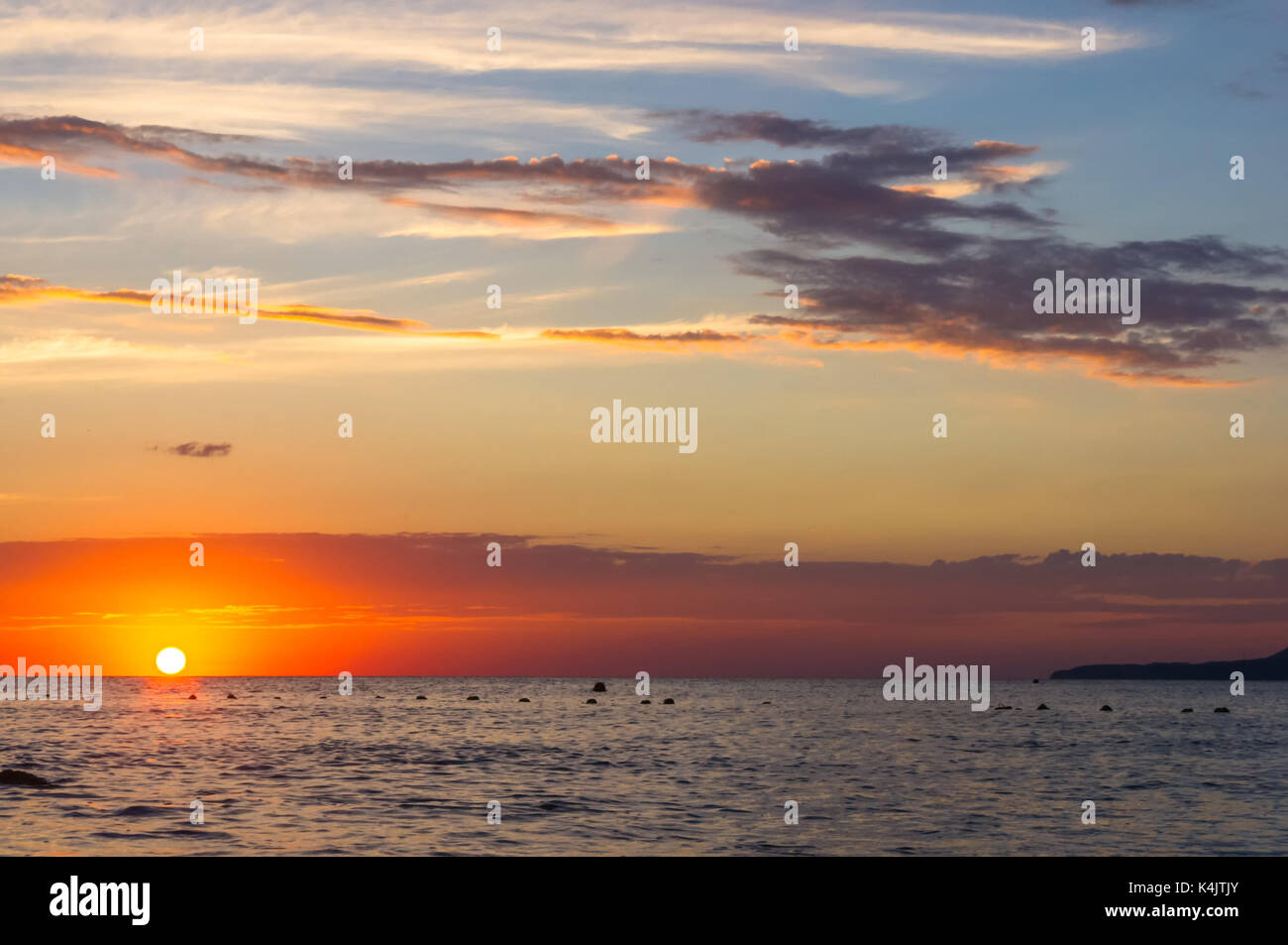 Summer sea sunset, the sun, waves and clouds, beautiful dramatic ...