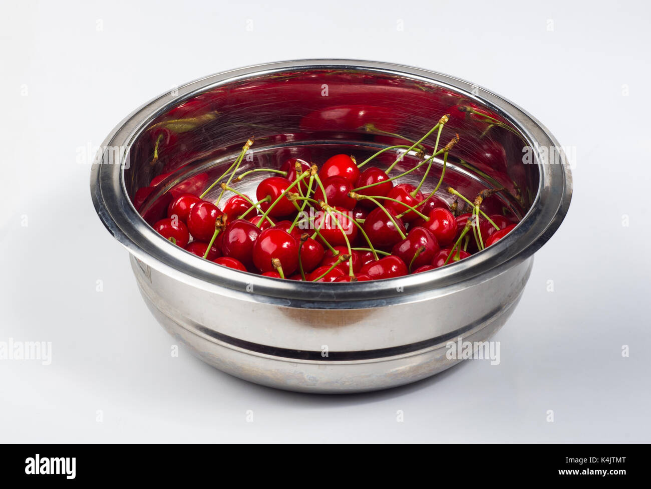 large ripe red cherries in a dish of stainless steel, close-up Stock ...
