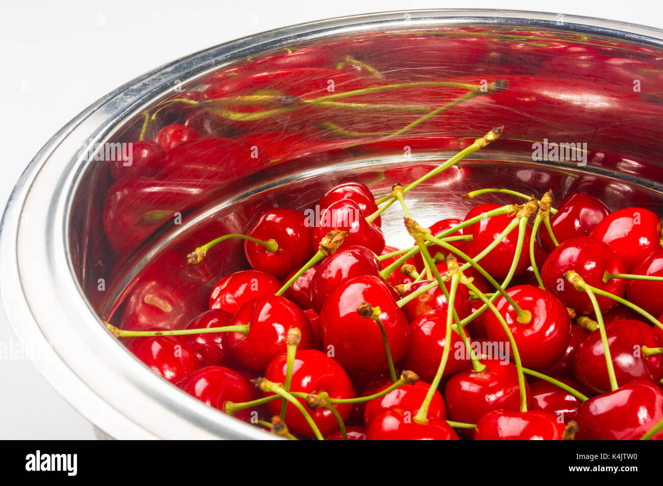 large ripe red cherries in a dish of stainless steel, close-up Stock ...