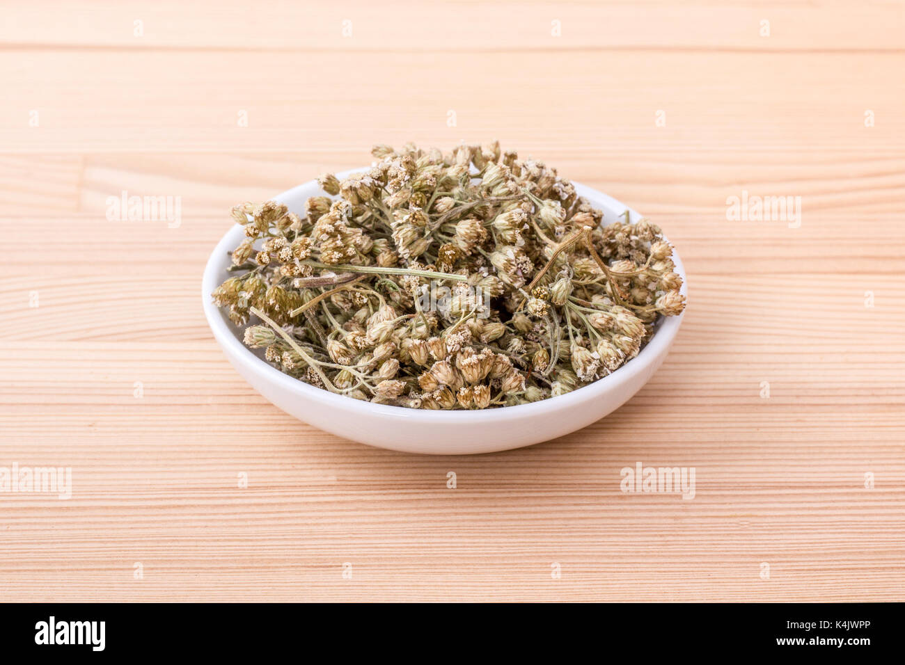 Bowl of dried yarrow blossoms Stock Photo - Alamy