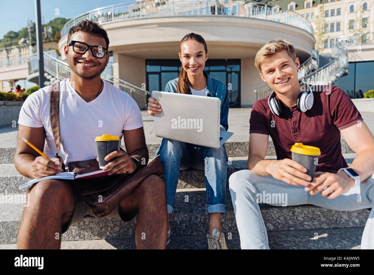 Delighted students looking straight at camera Stock Photo - Alamy