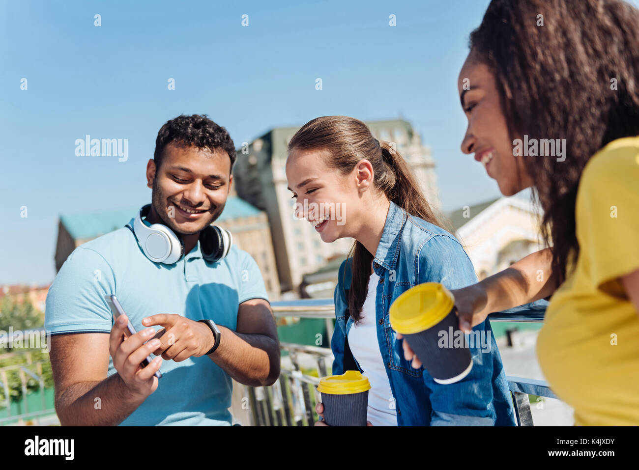 Positive girls laughing from funny joke Stock Photo - Alamy