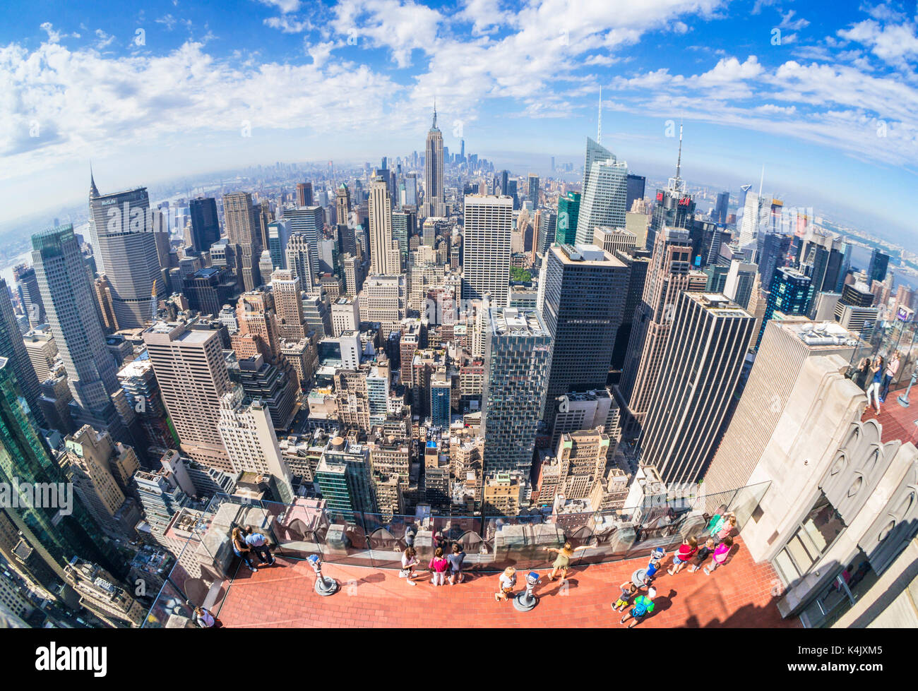Tourists on Top of the Rock viewing deck, Rockefeller Centre, Manhattan ...