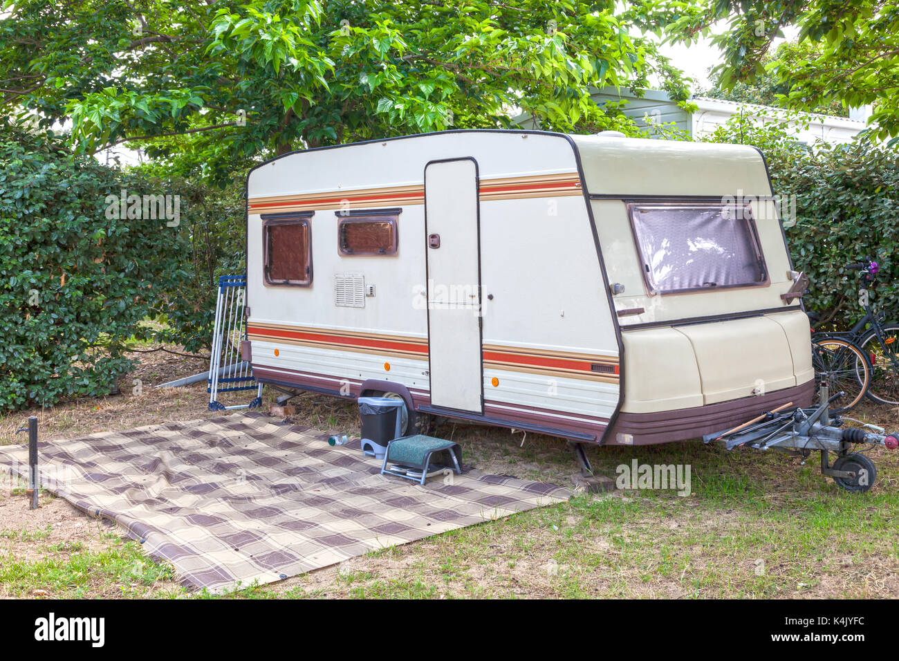 Classic caravan trailer on a camping site Stock Photo - Alamy